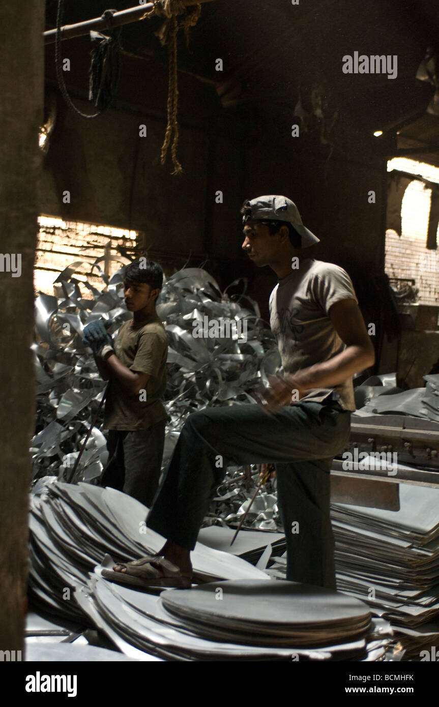 Dhaka child labour Metal turning factory Stock Photo - Alamy