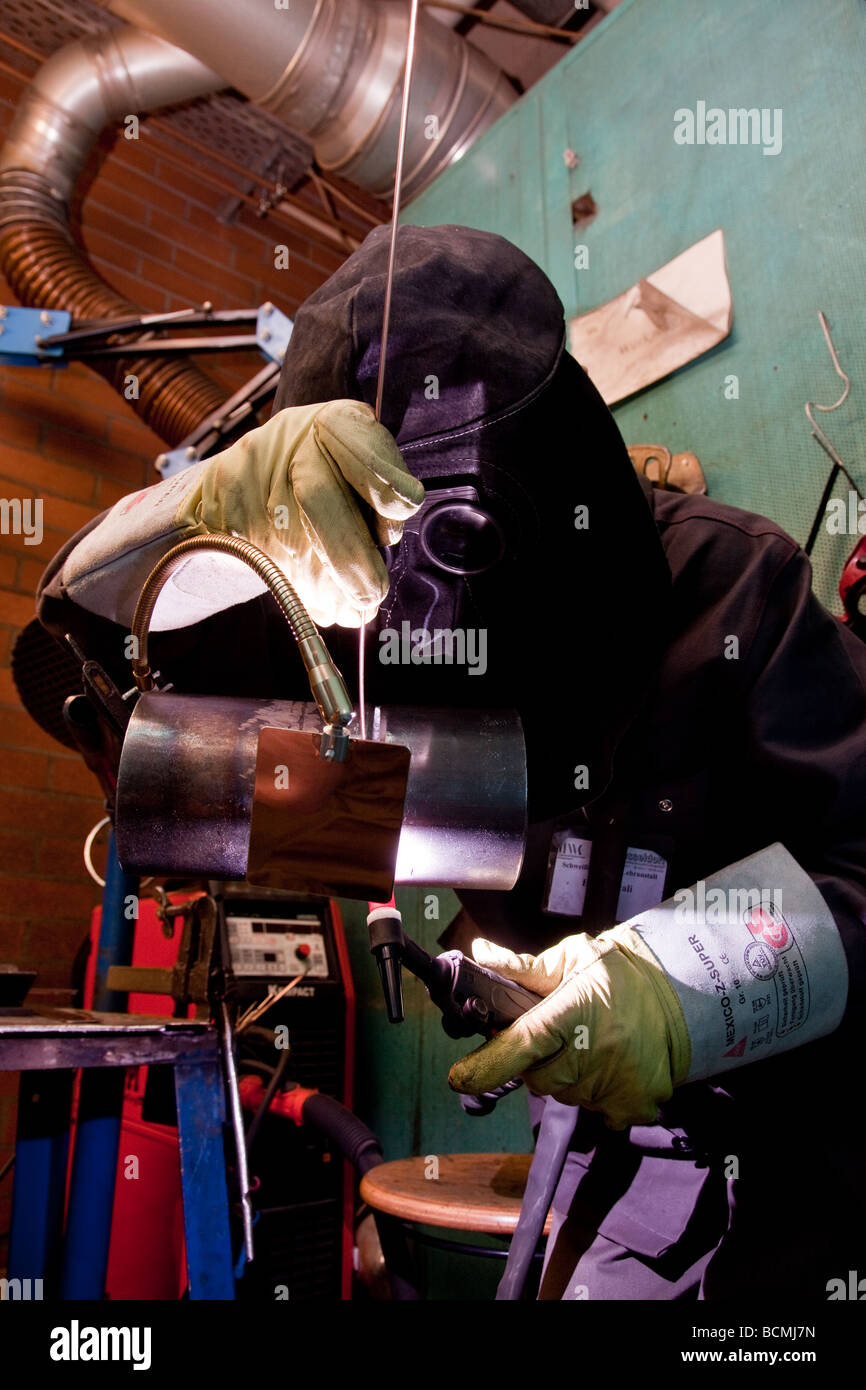 MIG and MAG welding with mirror Stock Photo - Alamy