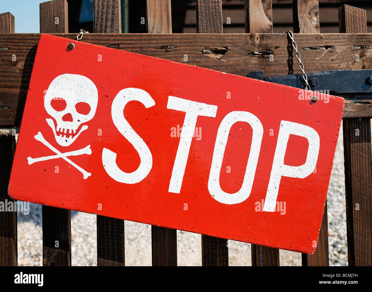 Stop sign with skull and crossbones Stock Photo - Alamy