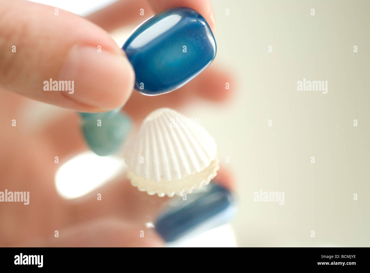 Shell finger hi-res stock photography and images - Alamy