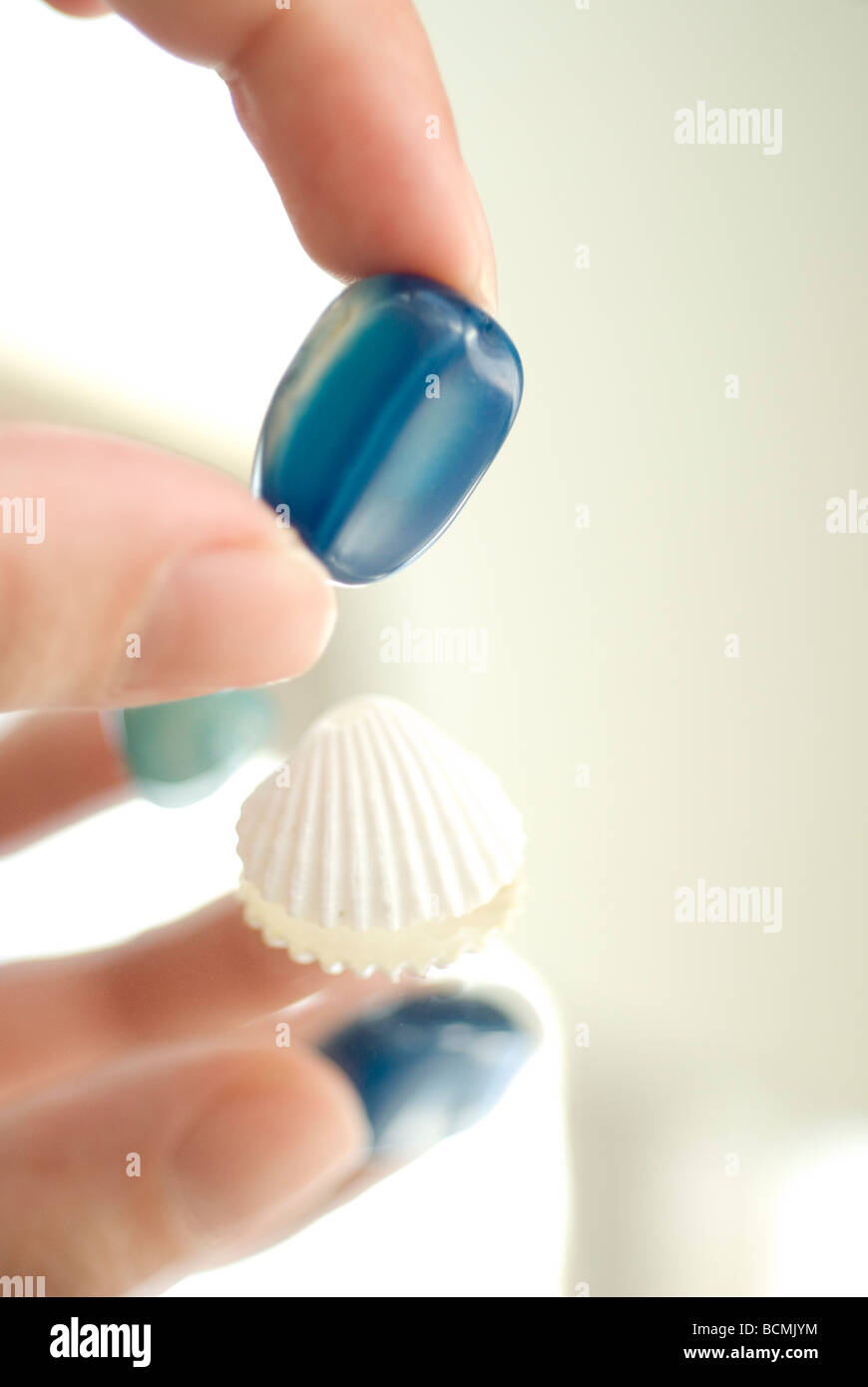 Shell finger hi-res stock photography and images - Alamy