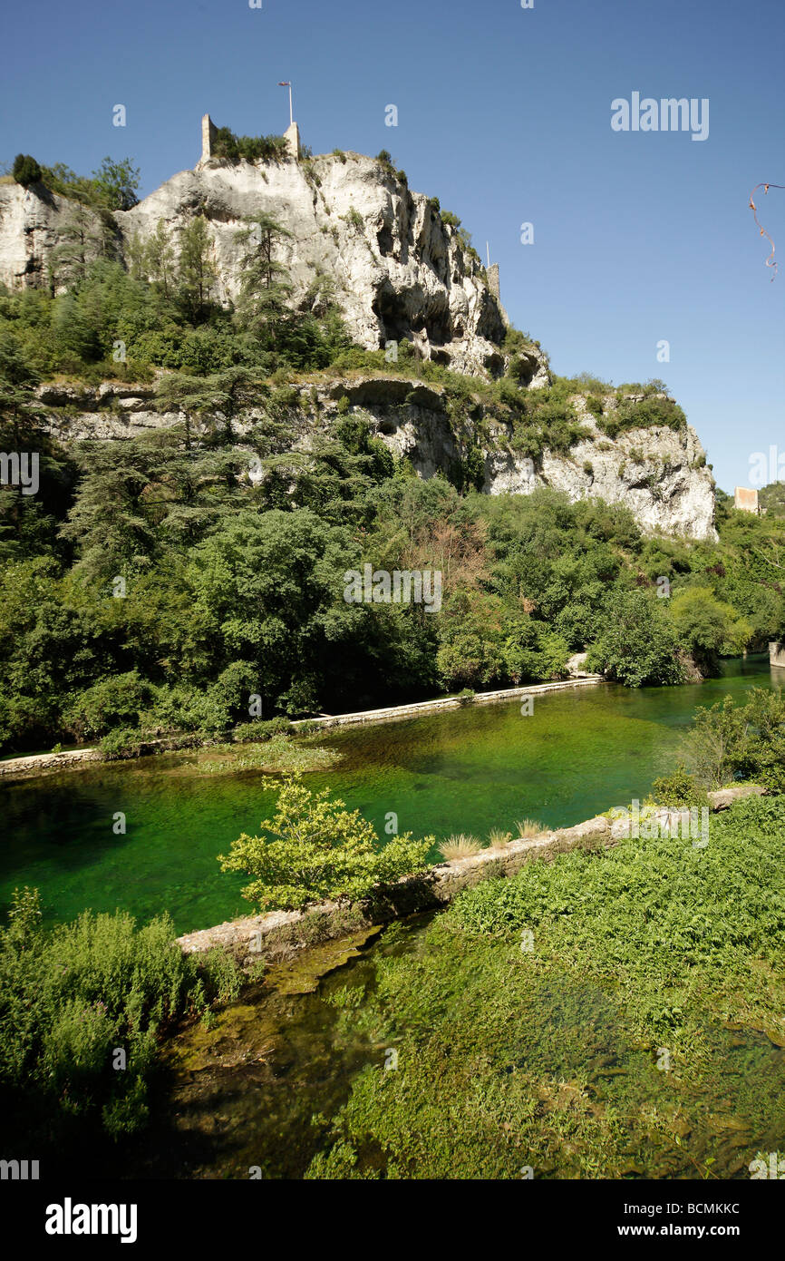 Castle ruins on a cliff on Sorgue River near Fontaine de Vaucluse ...