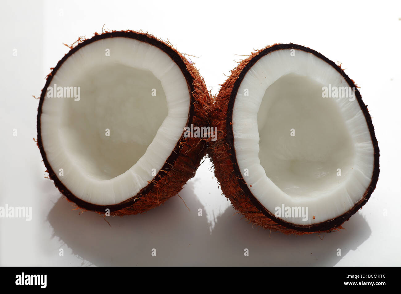 Coconut made in to two Stock Photo - Alamy