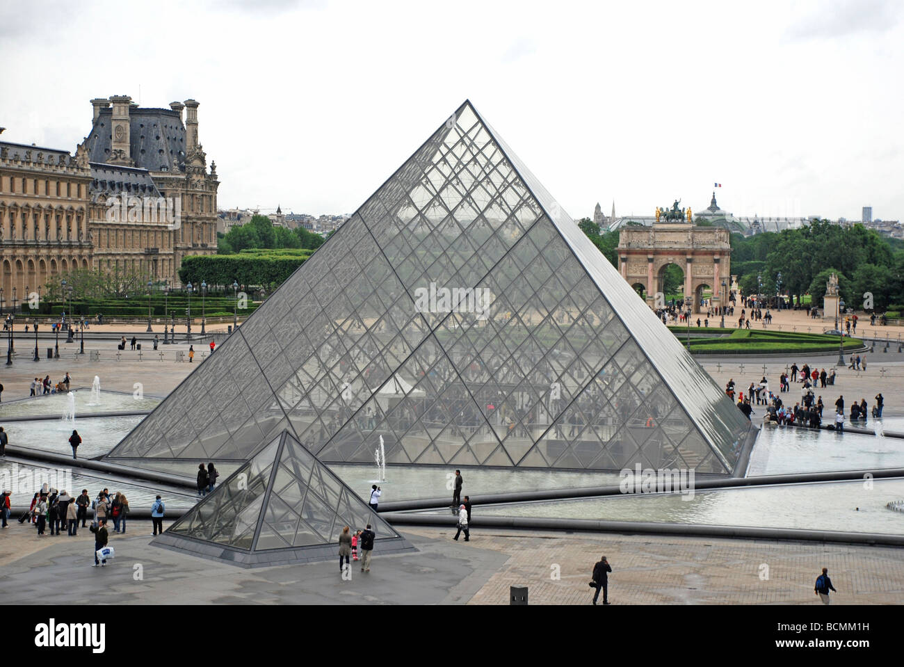 Glass Pyramid main entrance The Louvre Paris and fountains Stock Photo ...