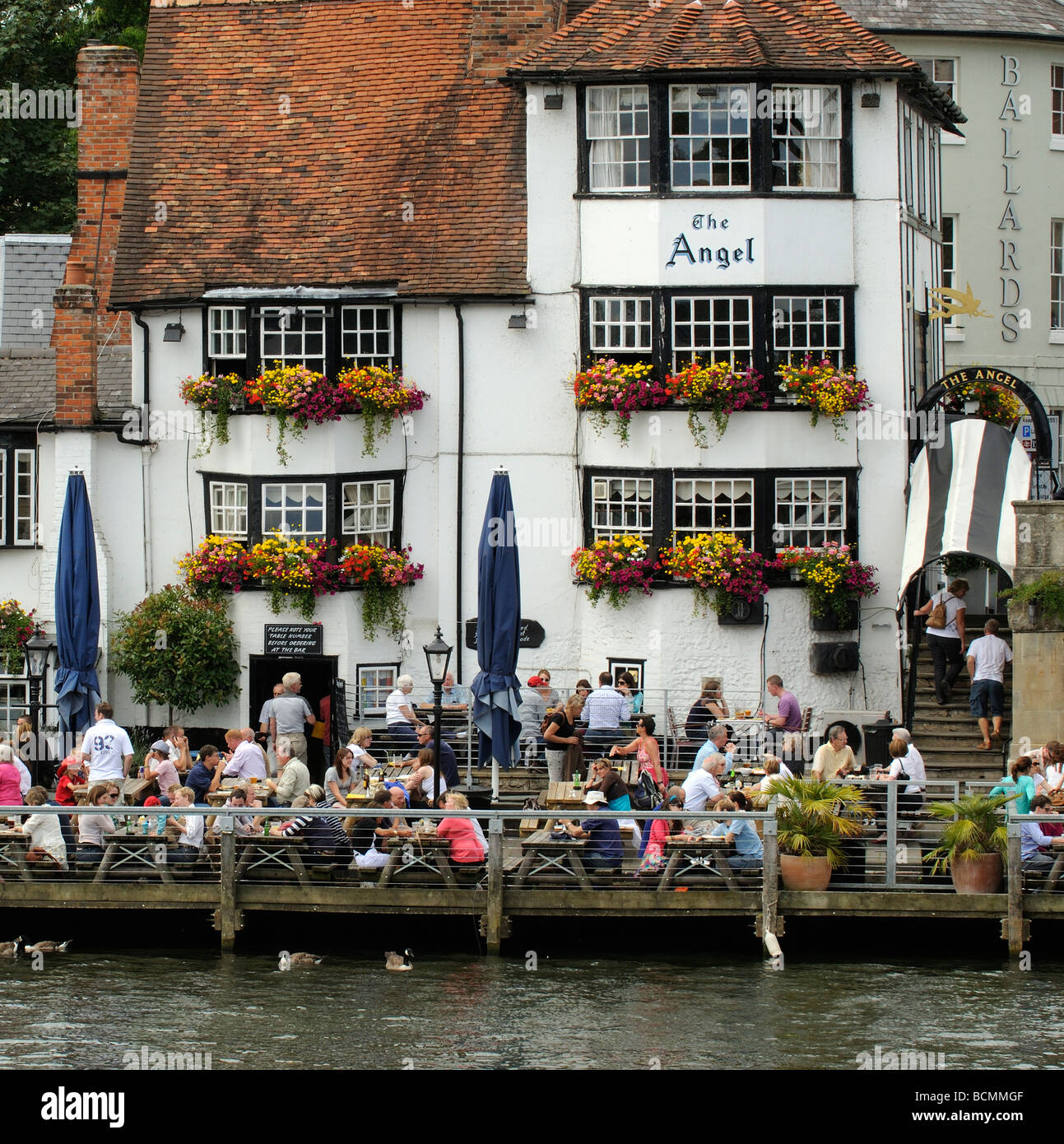 English riverside pub people eating drinking outside The Angel public ...