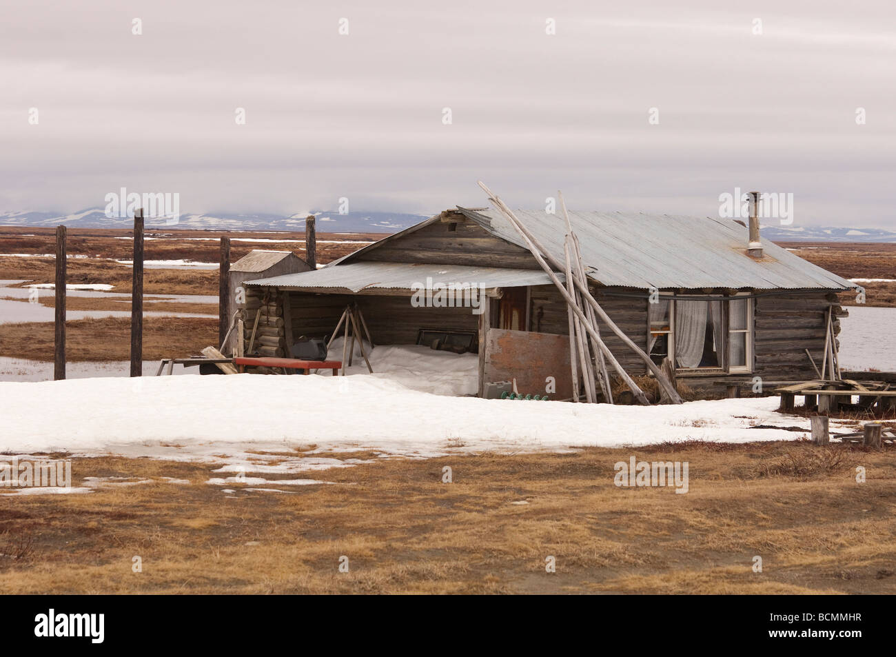 A SUBSISTENCE FISHING AND HUNTING CABIN ALONG THE BERING SEA Stock ...
