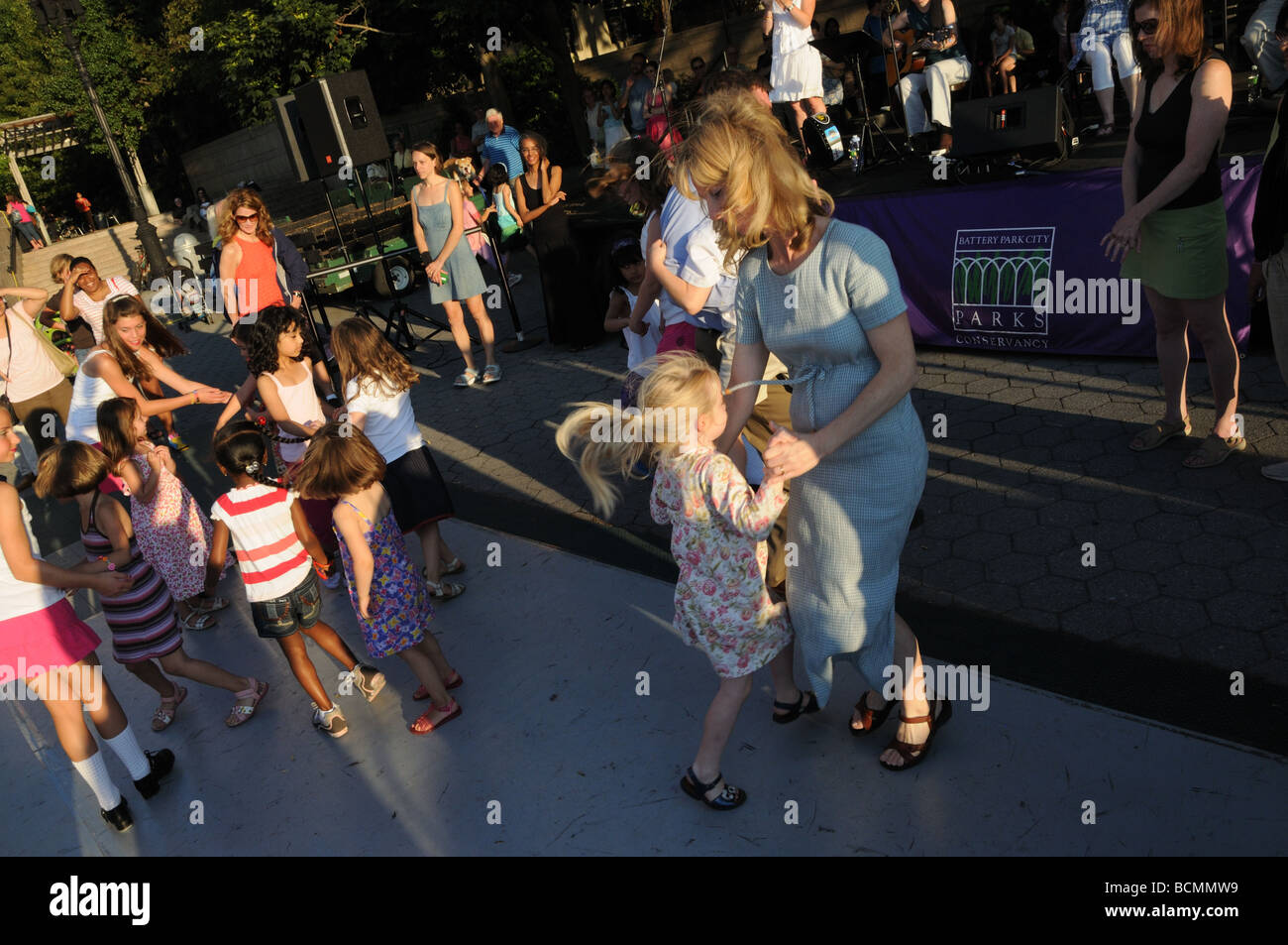 Dancers of all ages participate in a community dance in Lower Manhattan ...