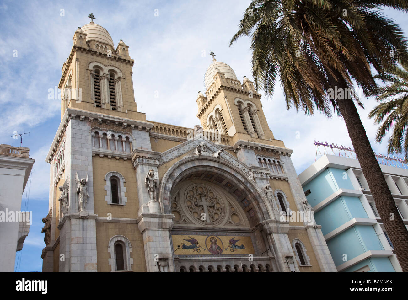 The Cathedral of St. Vincent de Paul towers high above Avenue Bourguiba ...