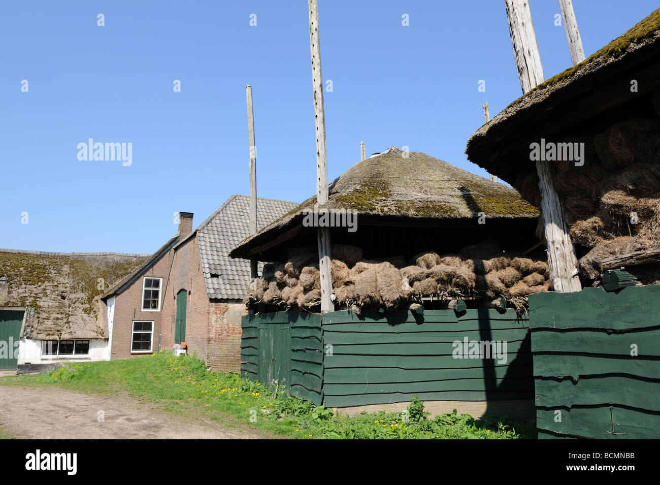 Dutch old farmhouse with hay stack Stock Photo - Alamy