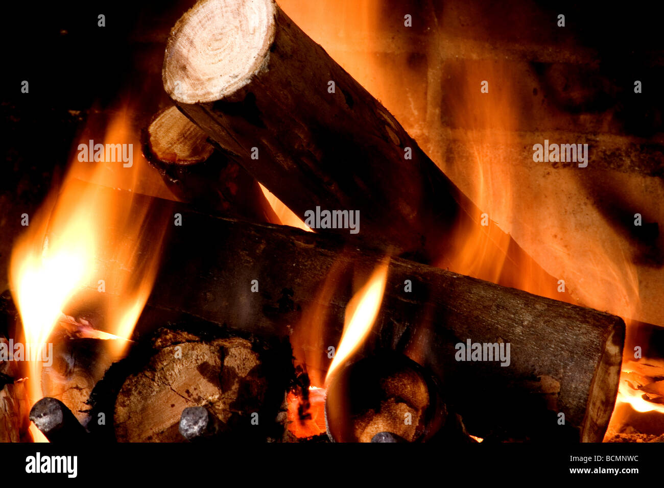 Burning logs close-up Stock Photo - Alamy