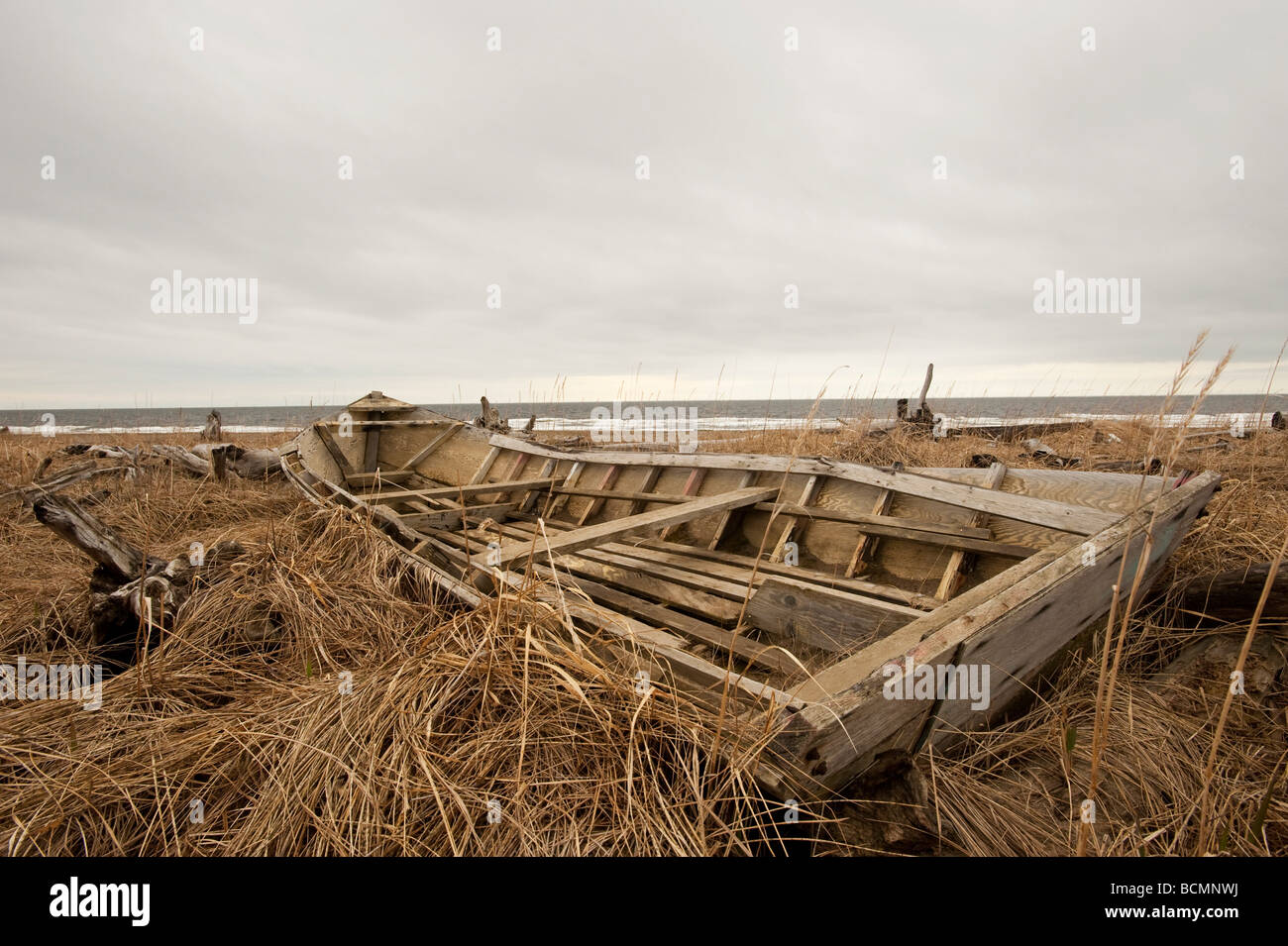 AN OLD WOOD FISHING BOAT FALLING APART ALONG THE BERING SEA Stock Photo ...
