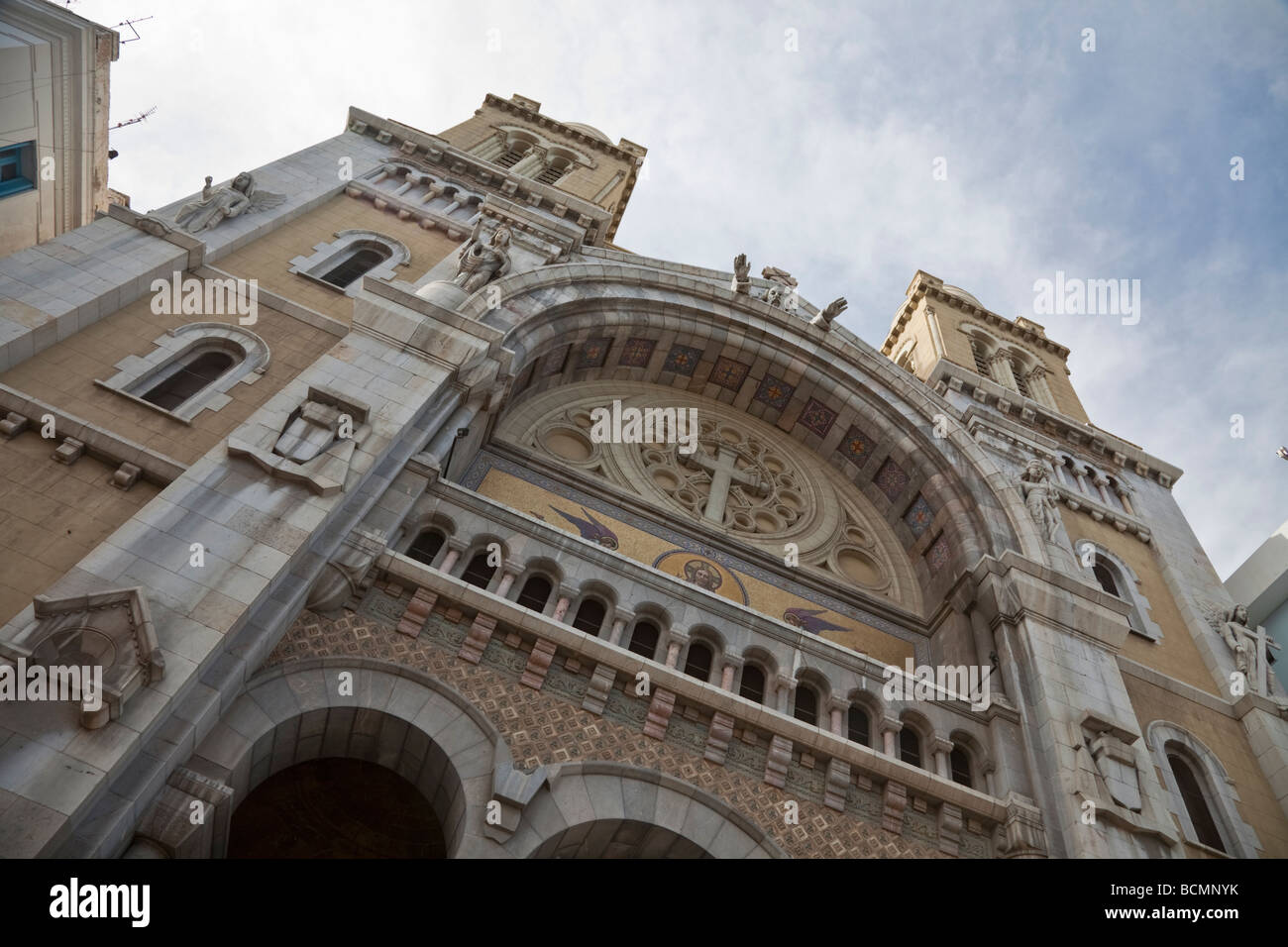 The Cathedral of St. Vincent de Paul towers high above Avenue Bourguiba ...