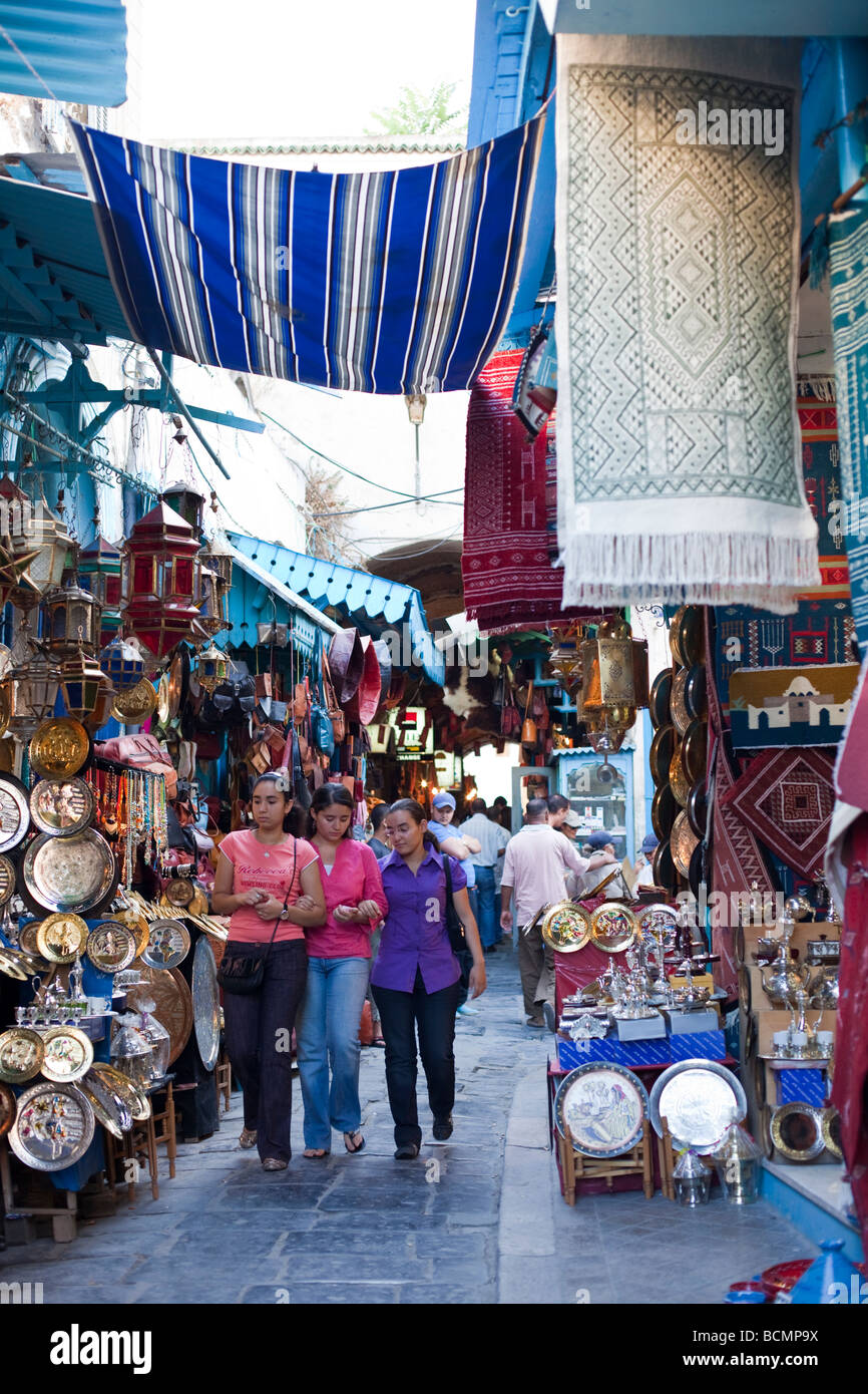 Residents browse the shops of the Tunis Medina in Tunisia. The Medina ...