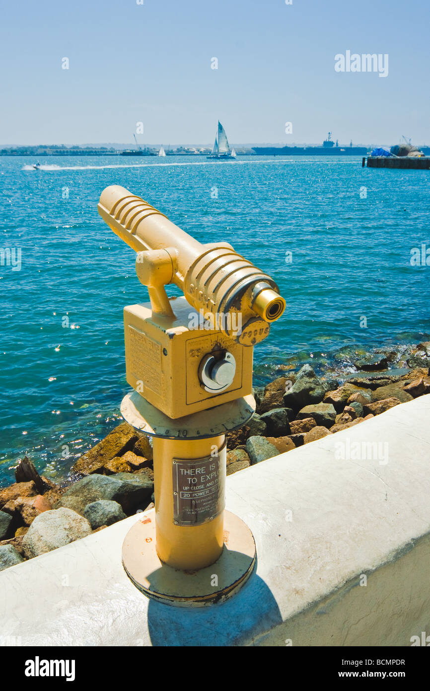 Spotting scope for the distant ships and clear waters by the paved ...