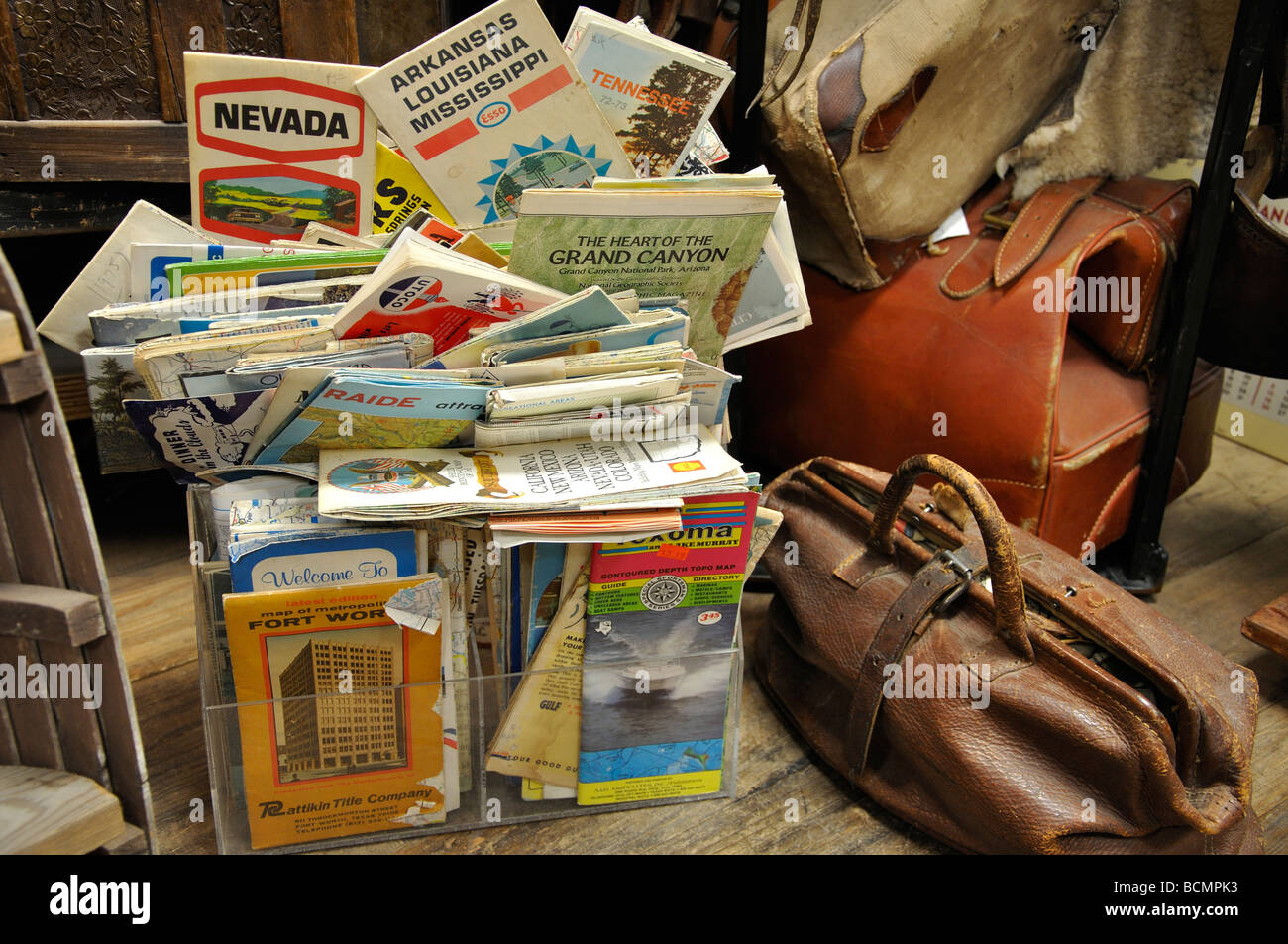 Vintage road maps in antiques store, USA Stock Photo - Alamy