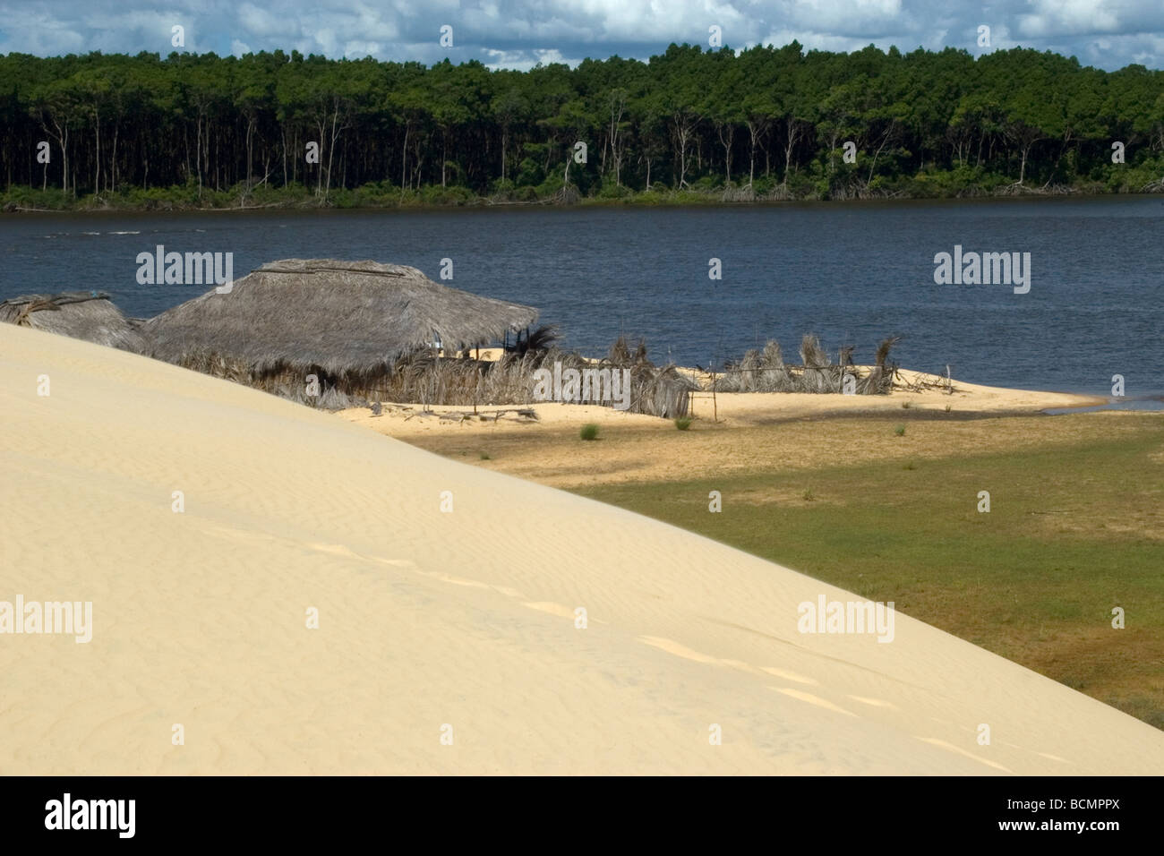 Sand dunes from Pequenos Lencois Maranhenses between the ocean and ...