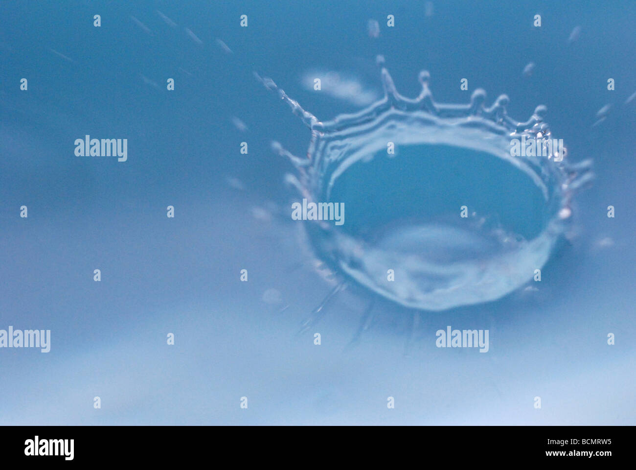 Macro close up of water drop splash Stock Photo - Alamy