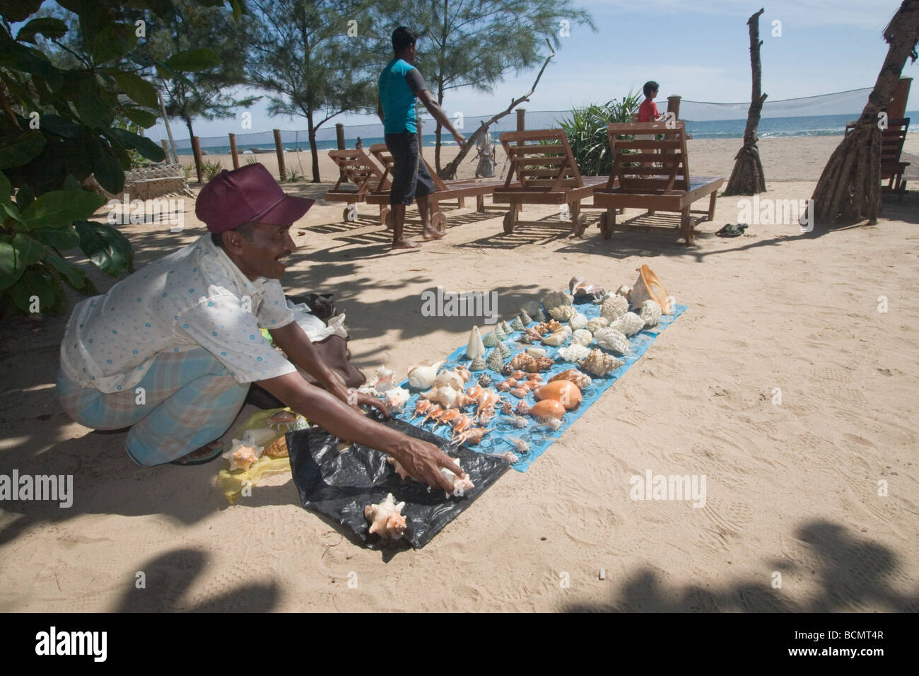 Man selling sea shells at Nilaveli beach, Trincomalee, Sri Lanka Stock ...