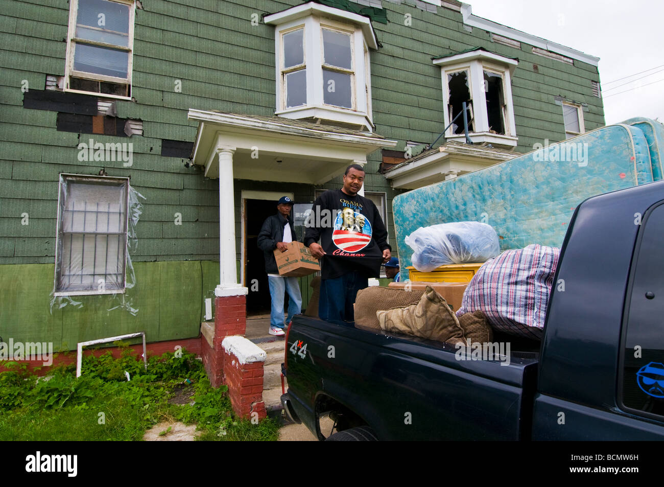 People moving from house Detroit Stock Photo - Alamy