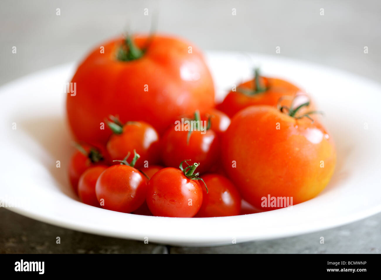 Different size tomatoes hi-res stock photography and images - Alamy