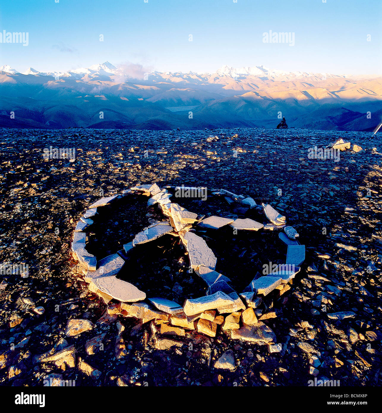 Stone formed symbol of worship overlooking Himalaya Mountain, Tibet ...