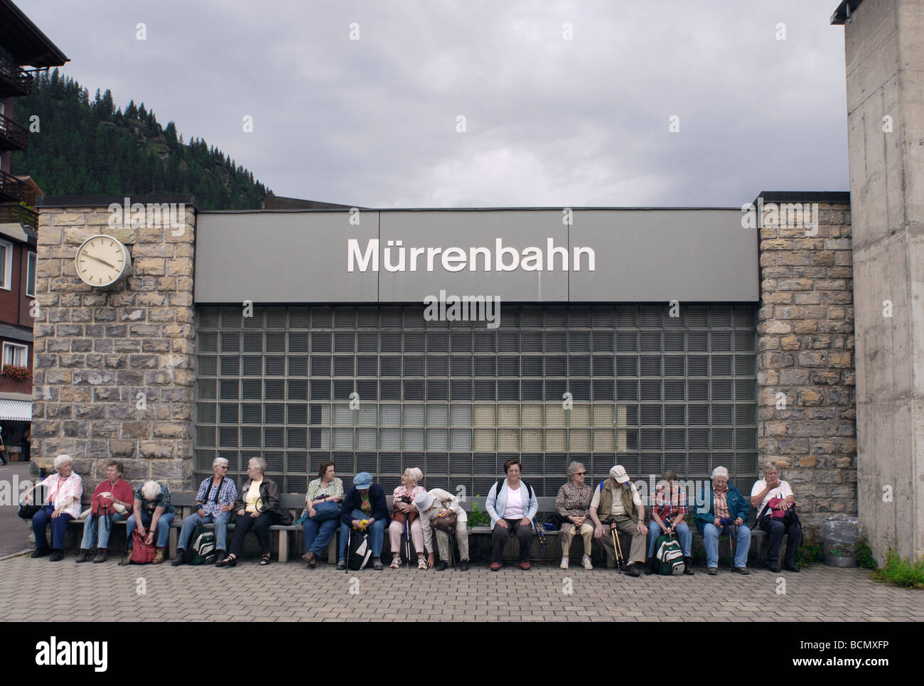 elderly tourists at Murren railway station Bernese Oberland Swiss Alps ...