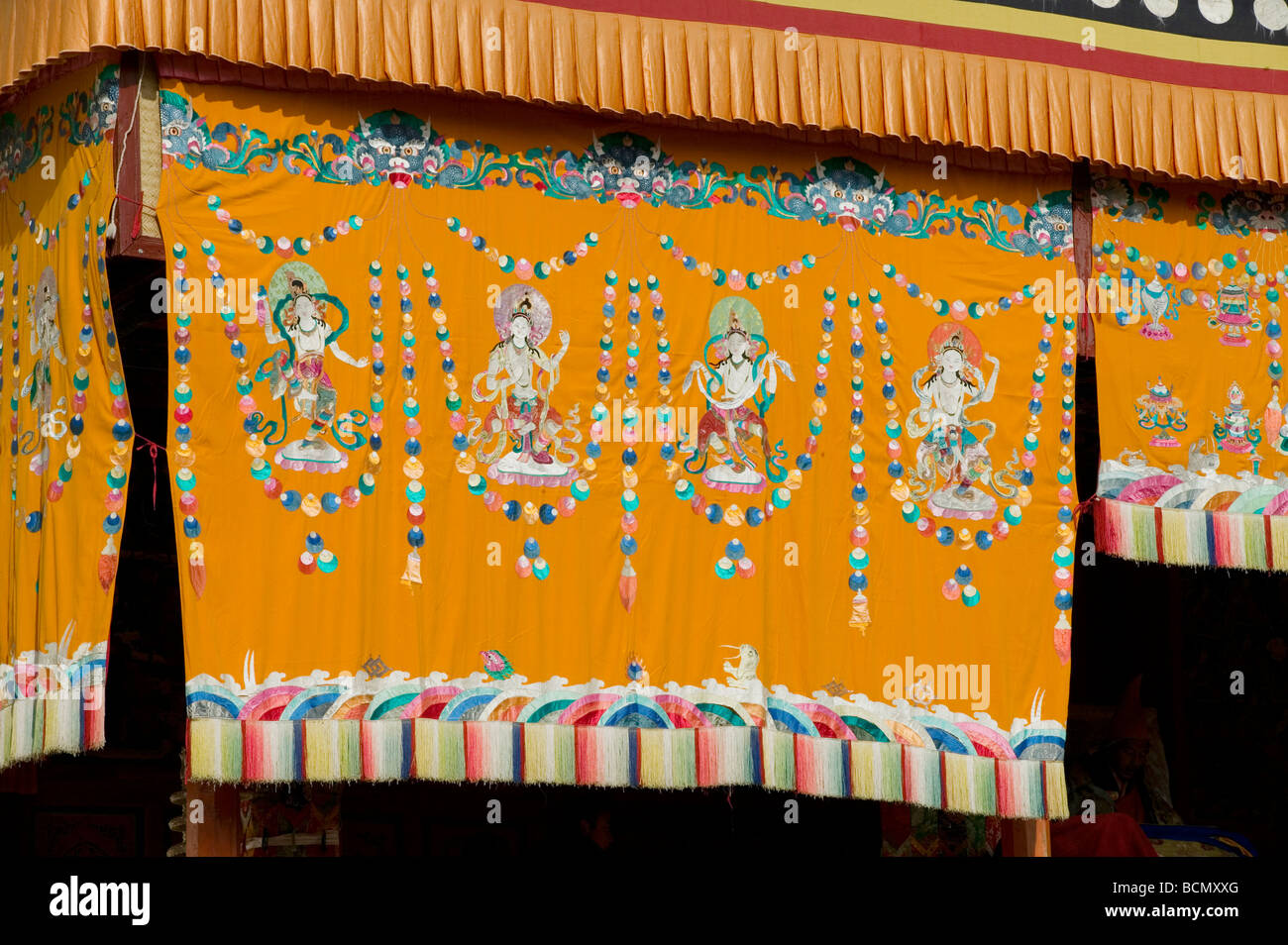 Prayer flag with embroidery of Buddha in the main prayer hall, Labrang ...