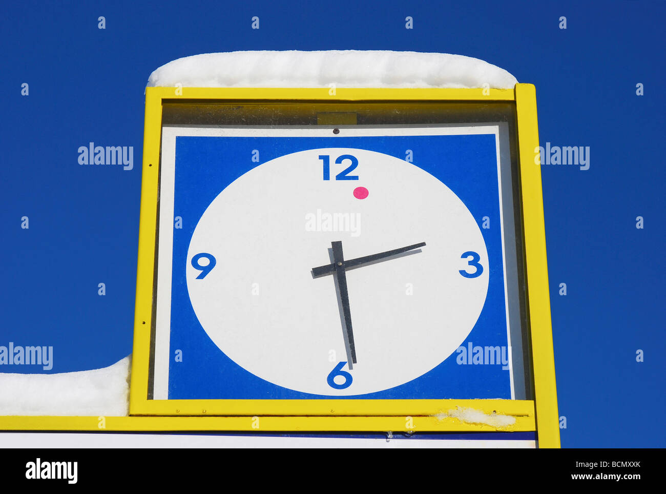snow covered large clock Stock Photo - Alamy