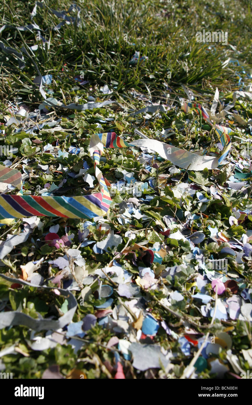 lots of colourful confetti and garlands on grass in field in sun Stock ...