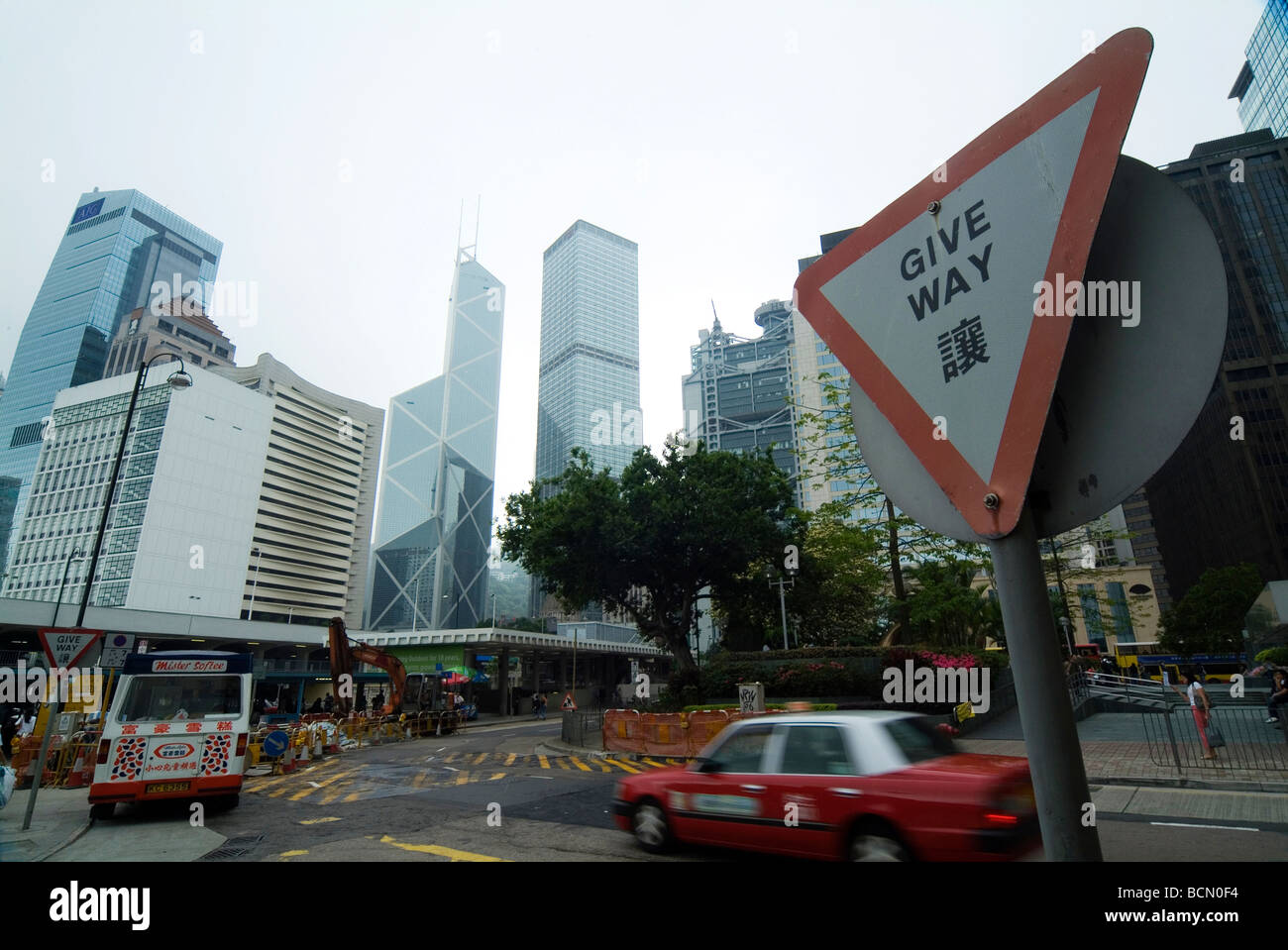Busy intersection with Bank of China building in the background ...