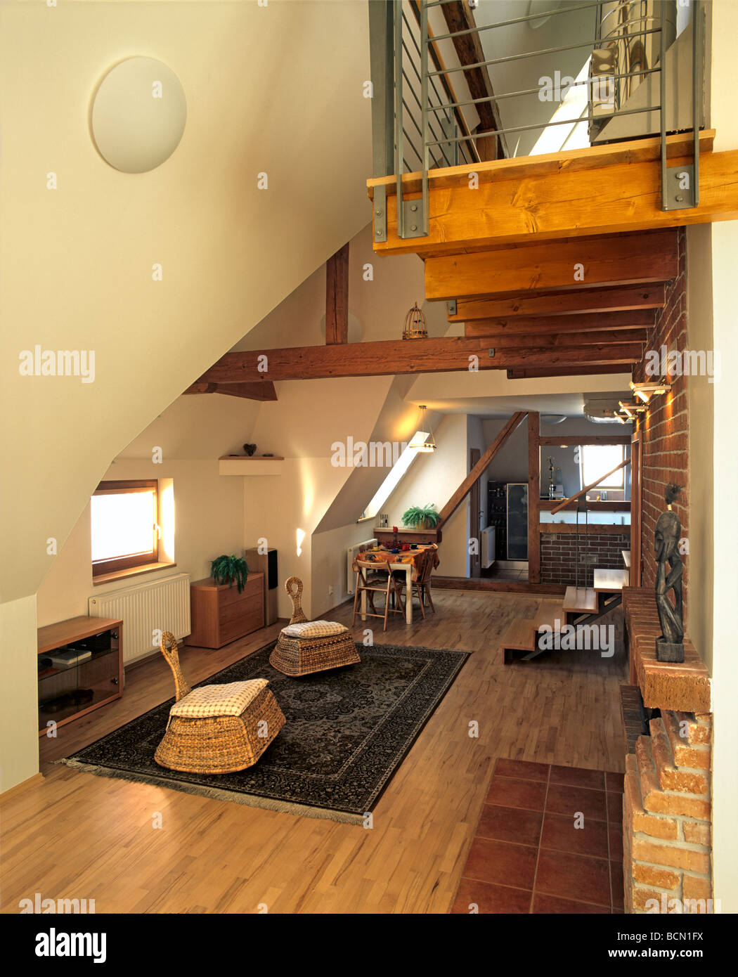 Sitting room in loft apartment Stock Photo - Alamy