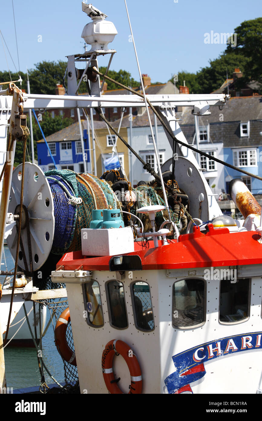 Fishing nets aboard a small trawler in weymouth harbour Dorset Stock ...