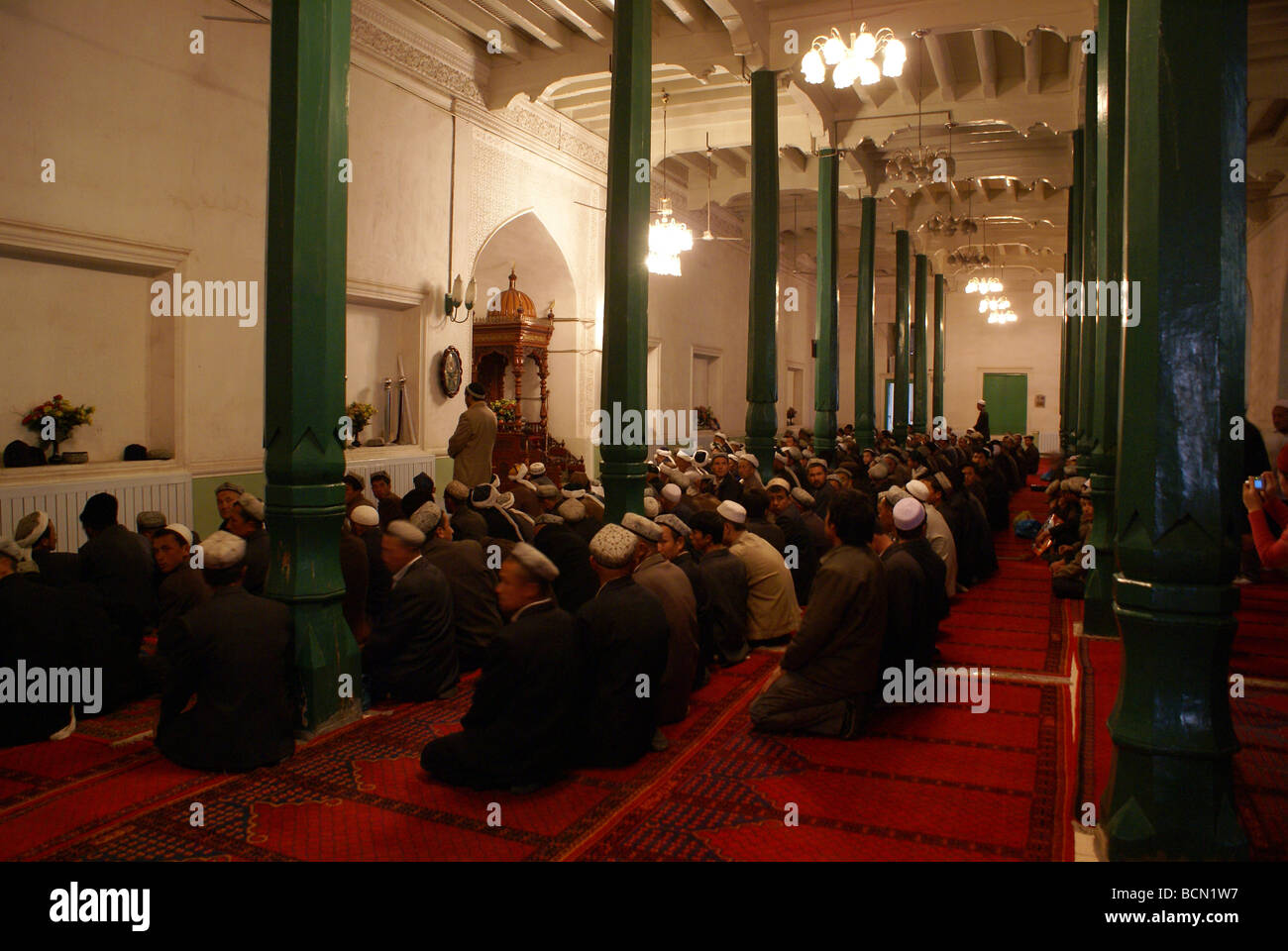 Uyghur Muslim gather together for prayer session in The Id Kah Mosque ...