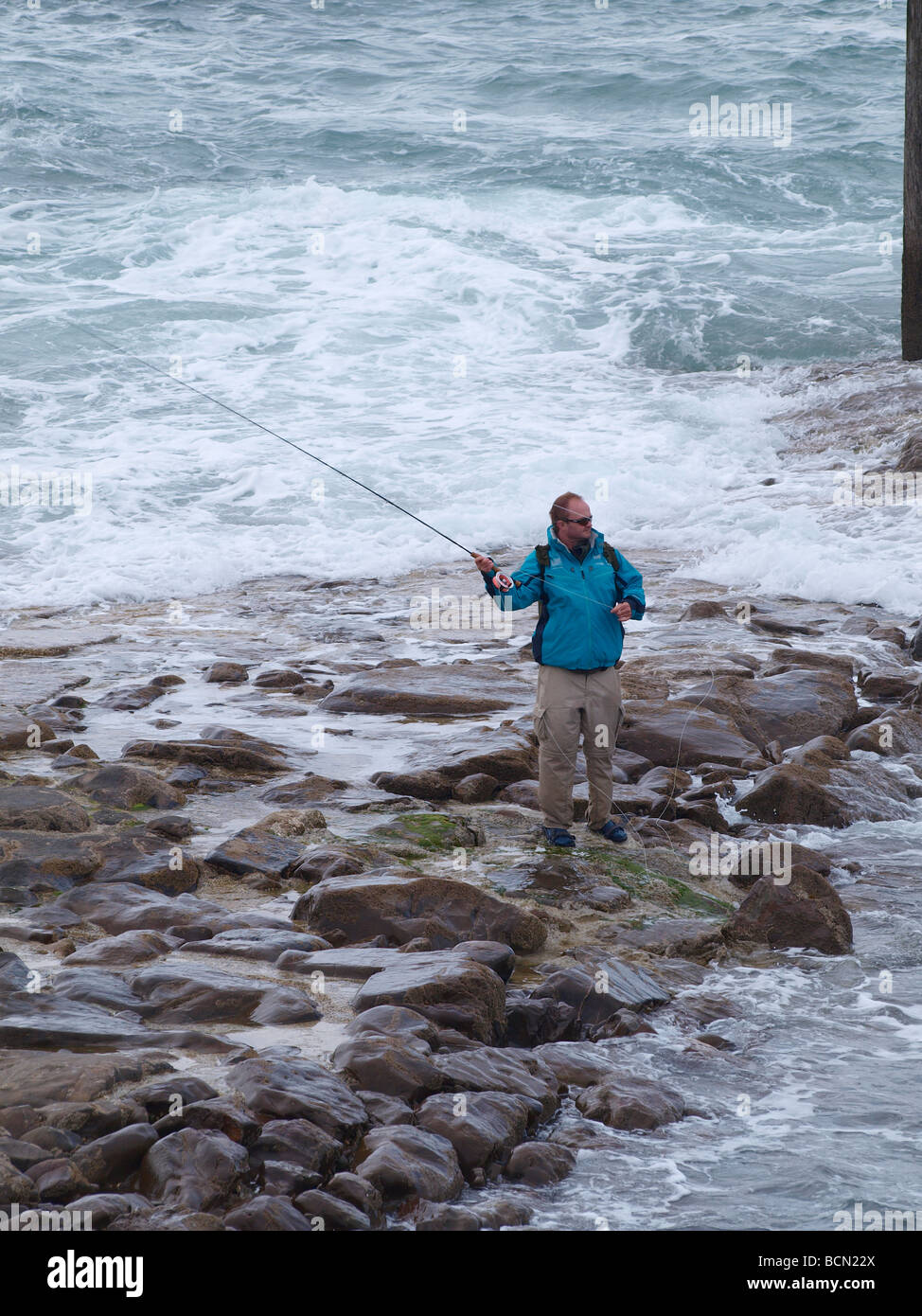 Sea fly fishing Stock Photo - Alamy