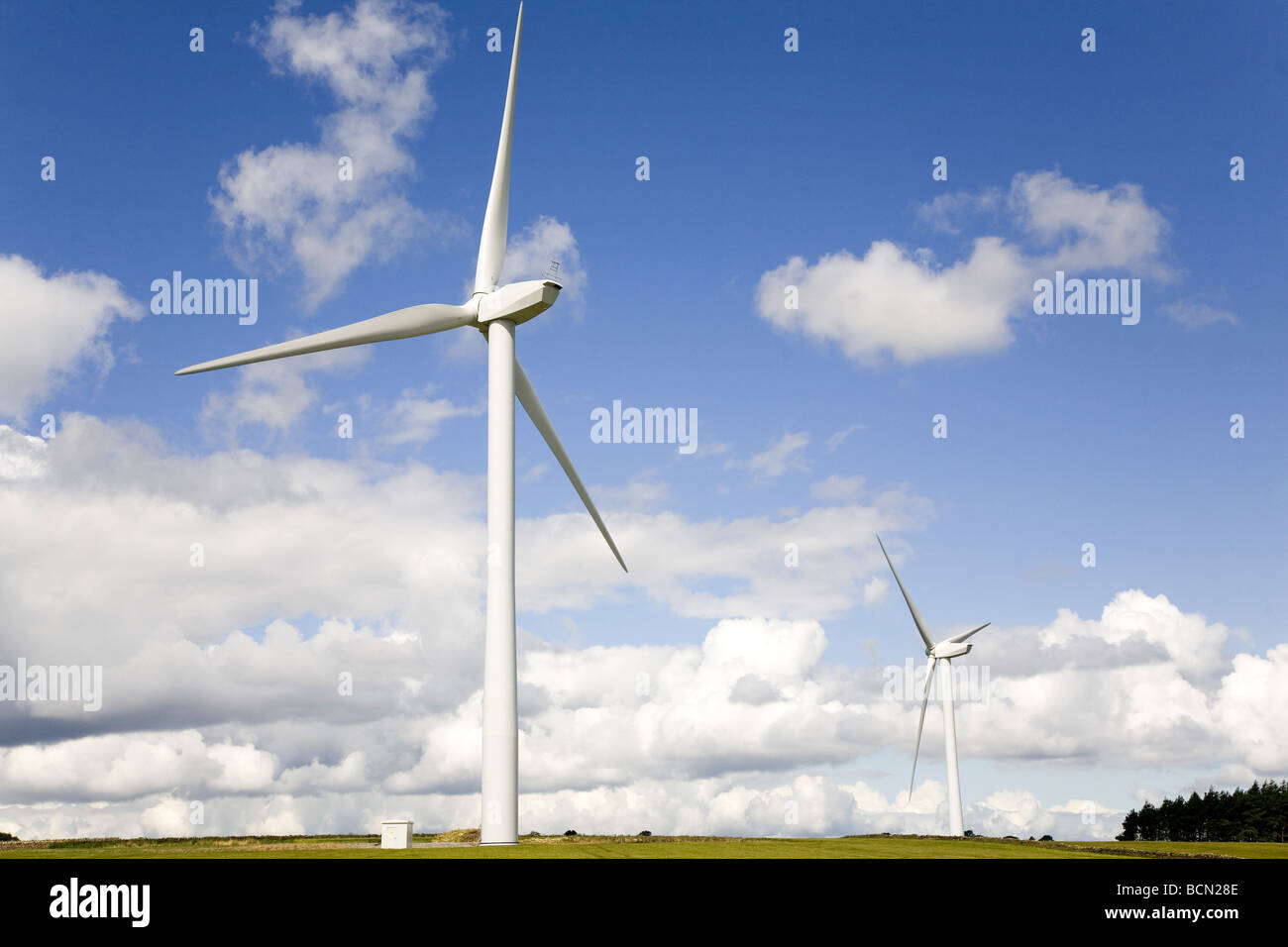 A wind farm stands in County Durham, England. Wind farms are a key ...