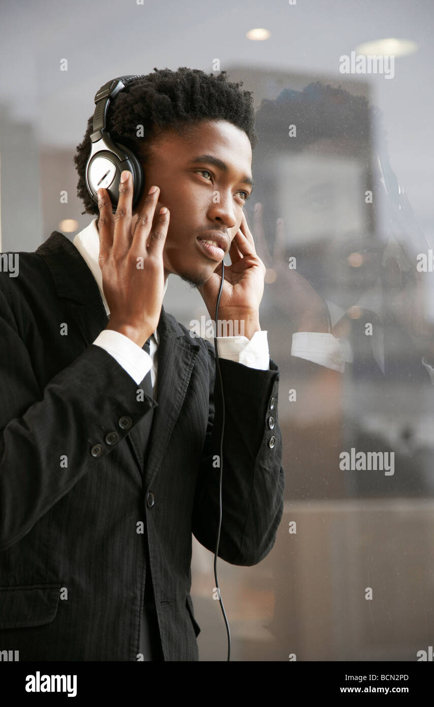 Man in headphones using hi-res stock photography and images - Alamy