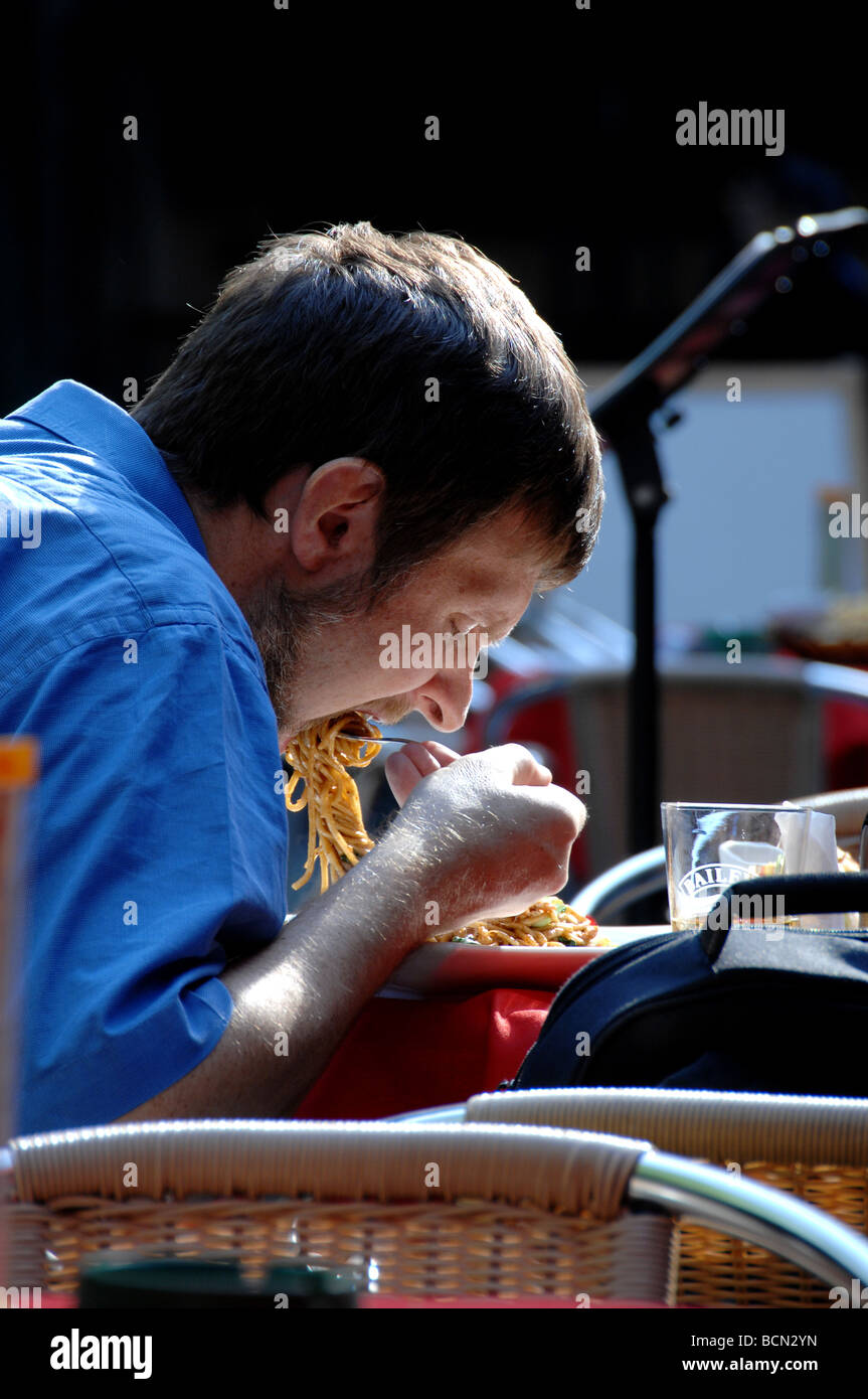 Old man eating spaghetti hi-res stock photography and images - Alamy