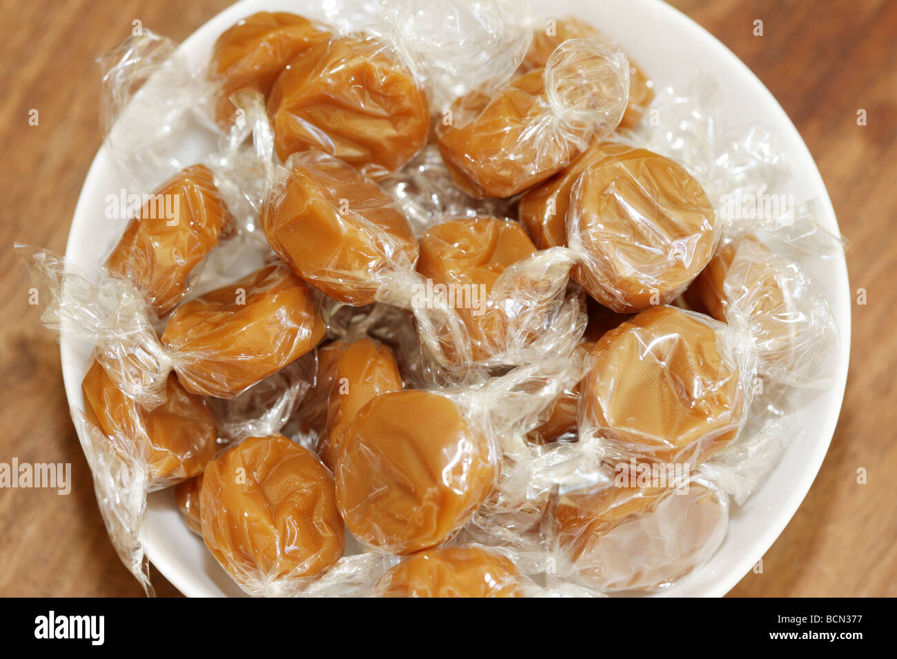Bowl Of Hard Traditional Chewy Dairy Toffee Sweets Confectionery With ...