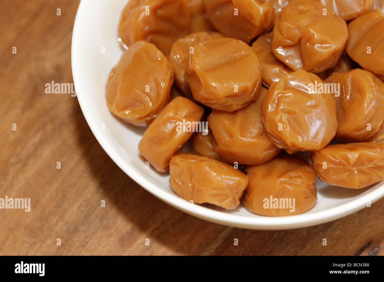 Bowl Of Hard Traditional Chewy Dairy Toffee Sweets Confectionery With ...