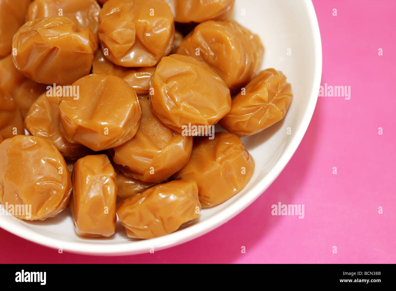Bowl Of Hard Traditional Chewy Dairy Toffee Sweets Confectionery With ...