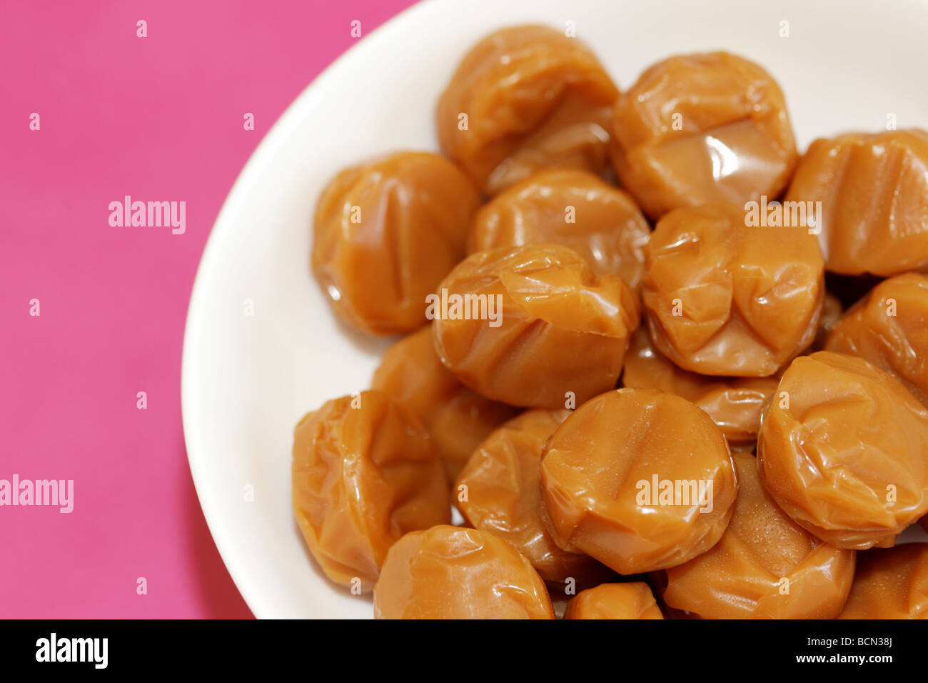 Bowl Of Hard Traditional Chewy Dairy Toffee Sweets Confectionery With ...