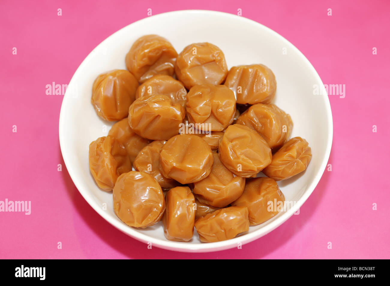Bowl Of Hard Traditional Chewy Dairy Toffee Sweets Confectionery With ...