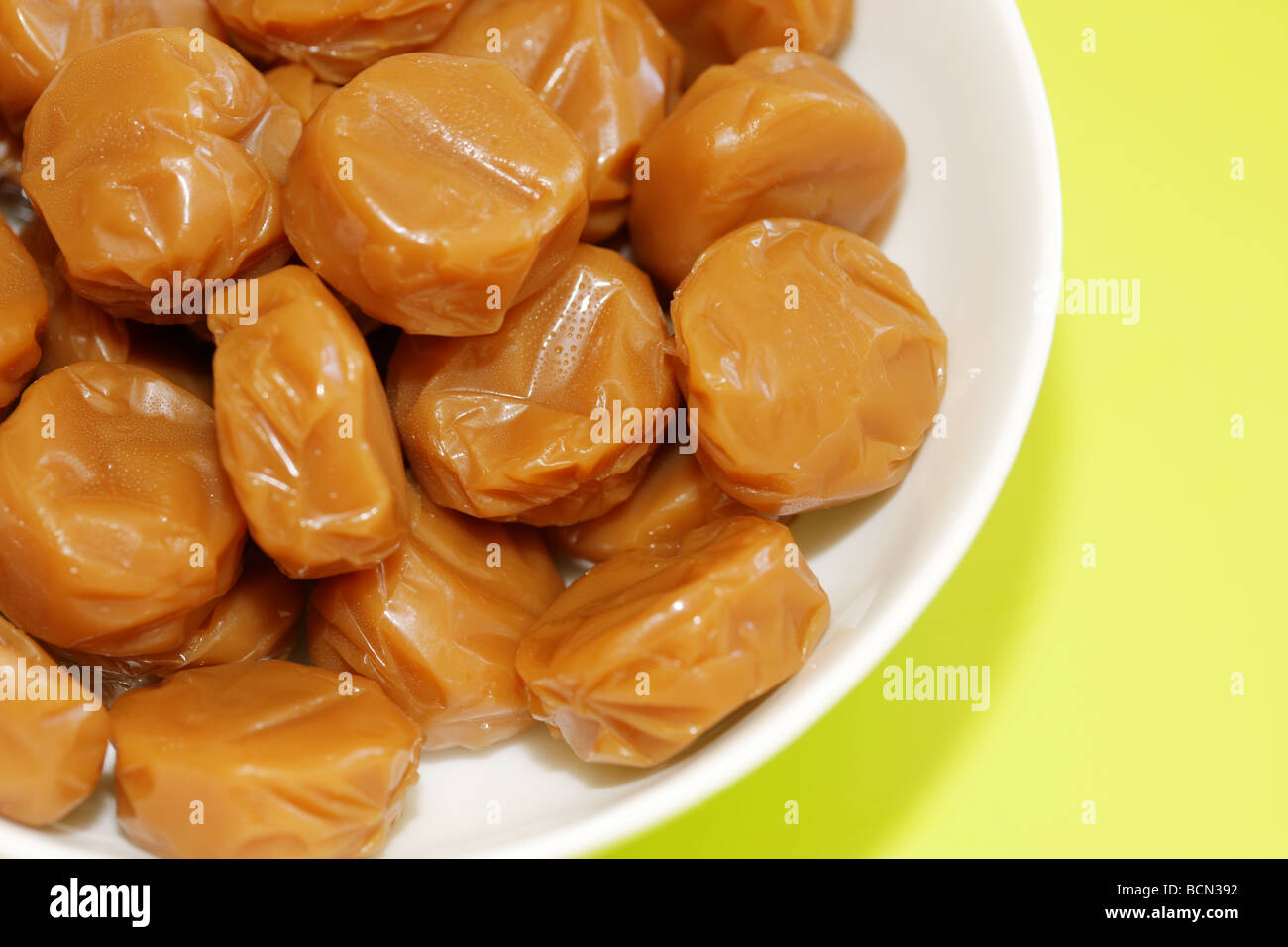 Bowl Of Hard Traditional Chewy Dairy Toffee Sweets Confectionery With ...