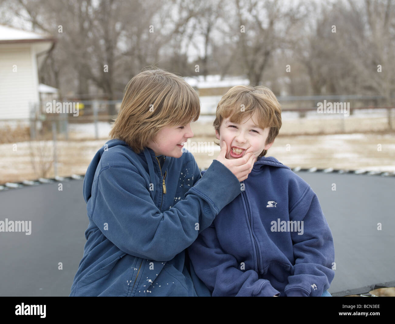 Boys teasing hi-res stock photography and images - Alamy