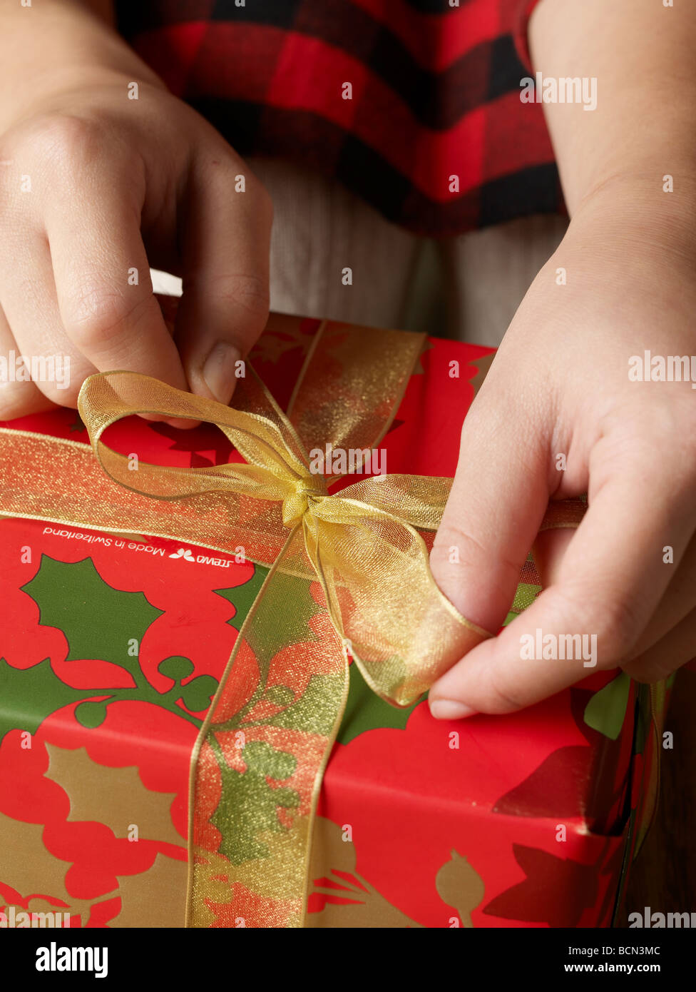 Person Wrapping Christmas Gift Stock Photo - Alamy