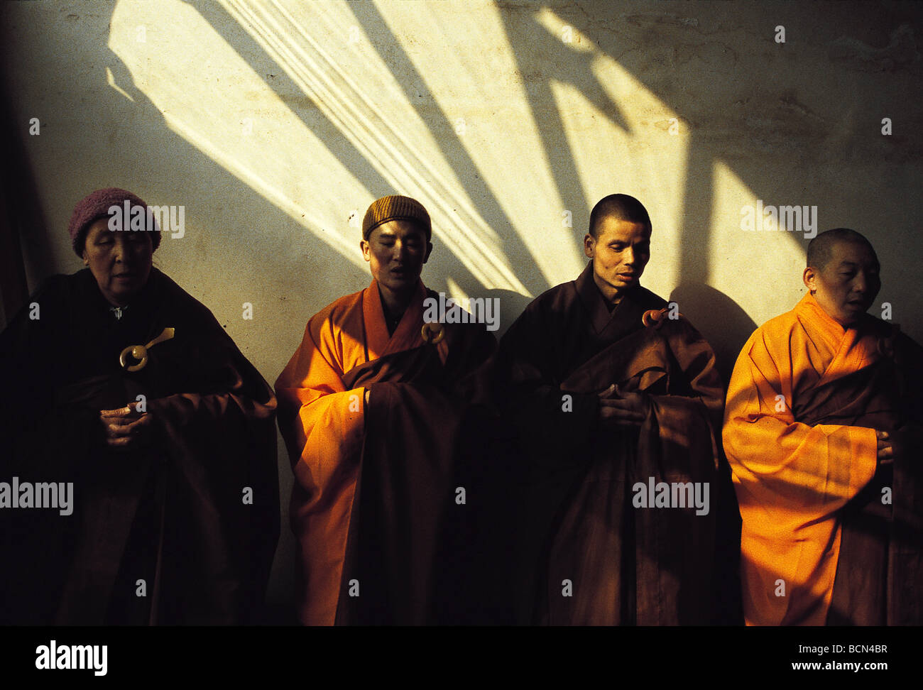 Monks saying prayers, Bailin Temple, Zhaoxiang County, Hebei Province ...