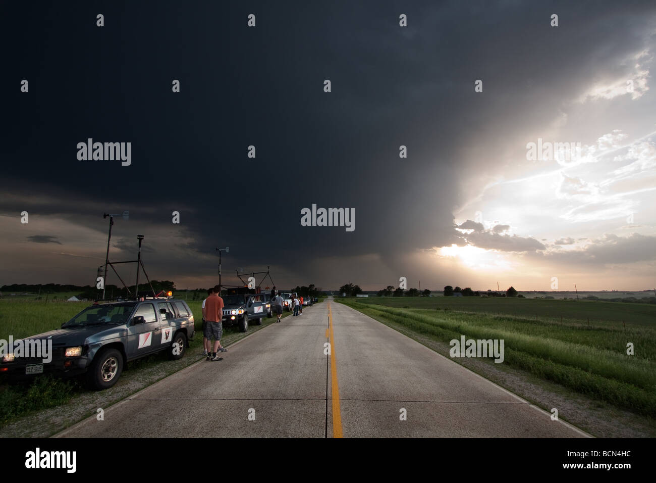 Cars of Project Vortex 2 line the highway in southwest Iowa May 31 2009 ...