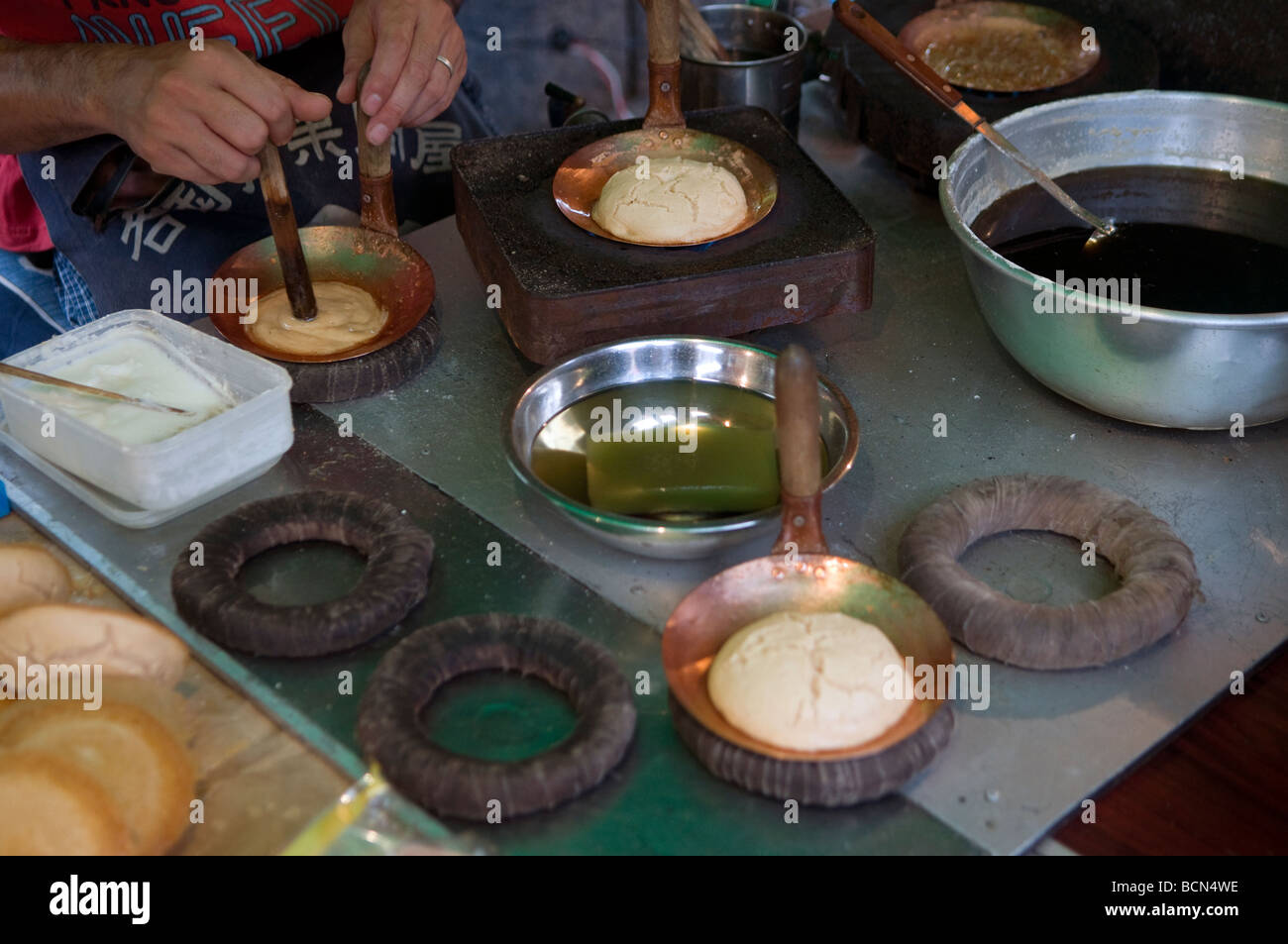 Rice cakes in food stall hi-res stock photography and images - Alamy
