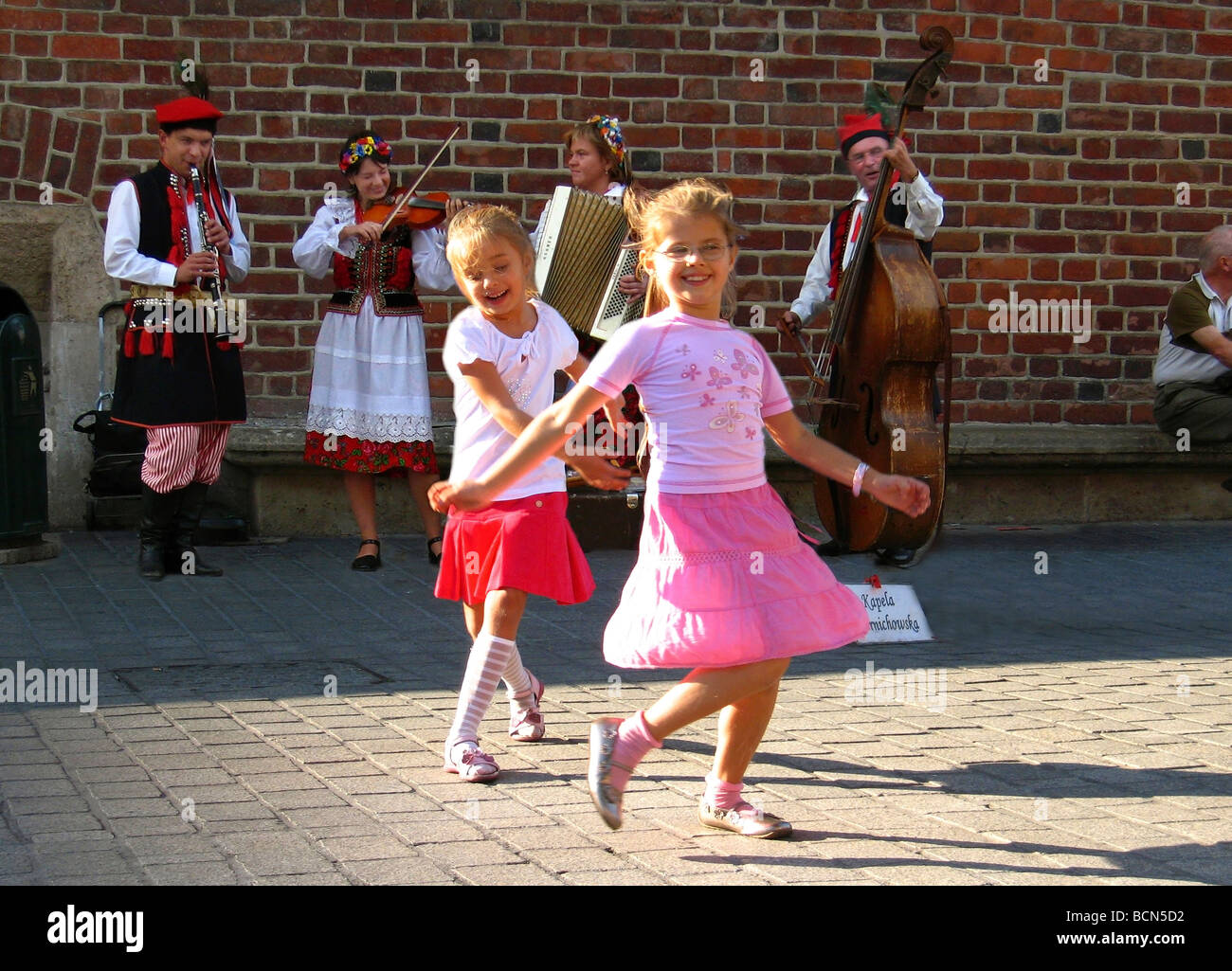Folklore band playing at Main Market Square in Krakow Poland Stock ...