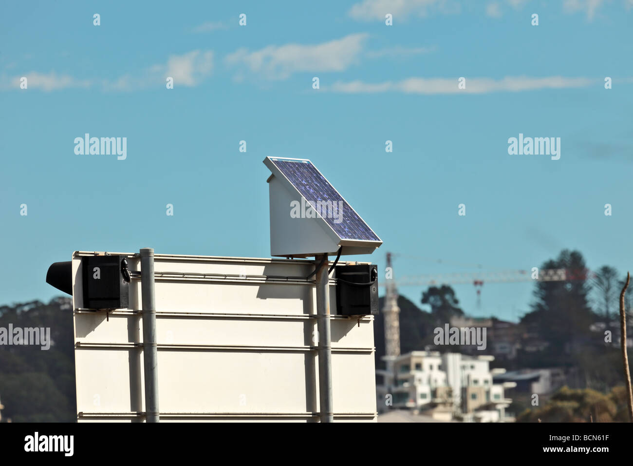 Solar panel using sunlight to power a sign Stock Photo - Alamy
